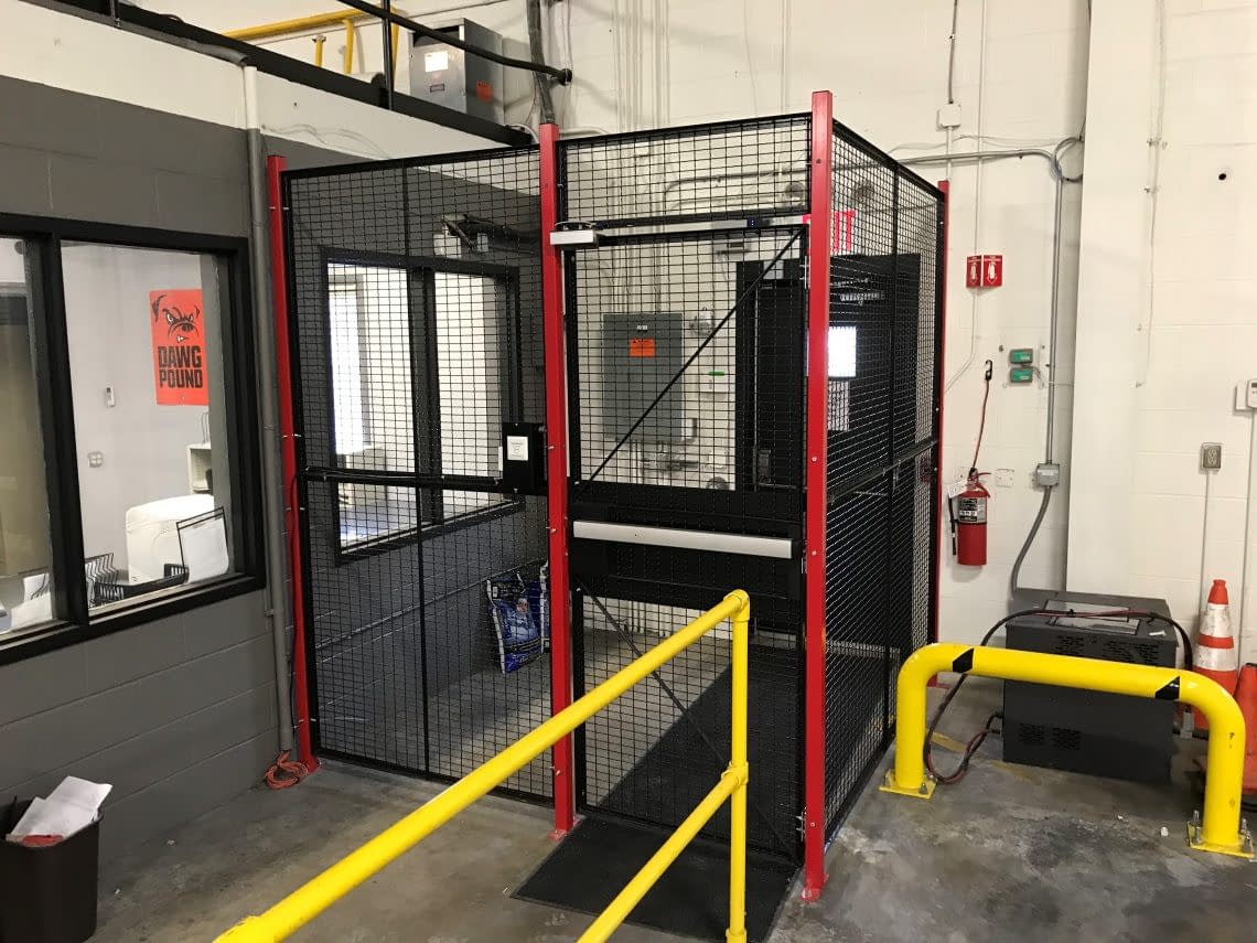 Protect Your Employees with Building Access Cages | Conveyer & Caster