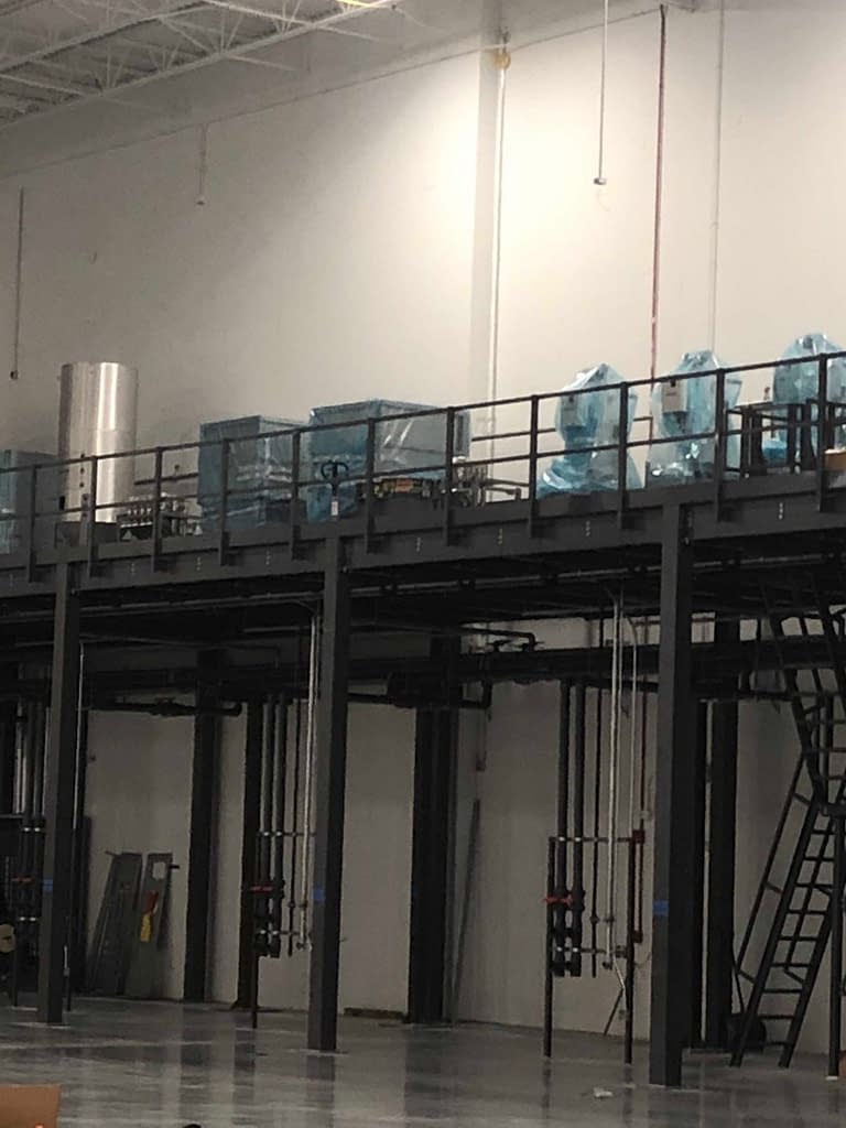 Prefabricated Steel Mezzanine Saves Manufacturer Time | Conveyer & Caster