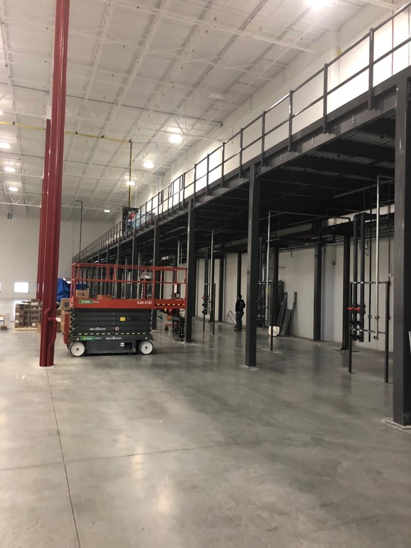 Prefabricated Steel Mezzanine Saves Manufacturer Time | Conveyer & Caster